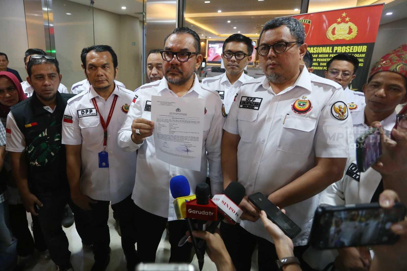 Ikatan Keluarga Minang Laporkan Abu Janda ke Bareskrim Polri - MerahPutih