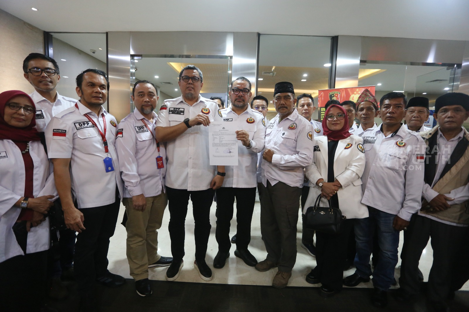 Ikatan Keluarga Minang Laporkan Abu Janda ke Bareskrim Polri - MerahPutih